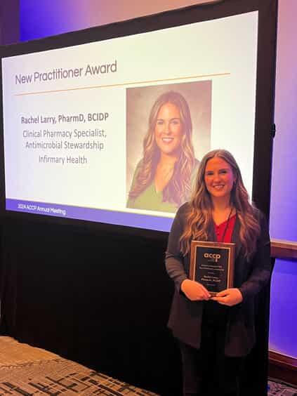 Rachel Larry, PharmD, BCIDP, receives the American College of Clinical ...